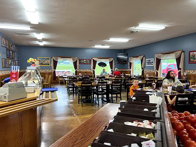 Inside, blue walls and simple wooden tables create that perfect "grandma's dining room" vibe where memories are made between bites.