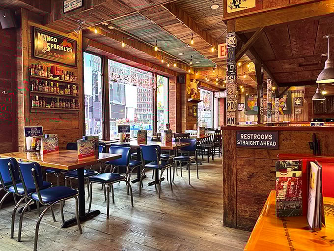Rustic wooden beams, license plate pillars, and warm lighting create that "just stepped off the shrimping boat" vibe in the heart of NYC.