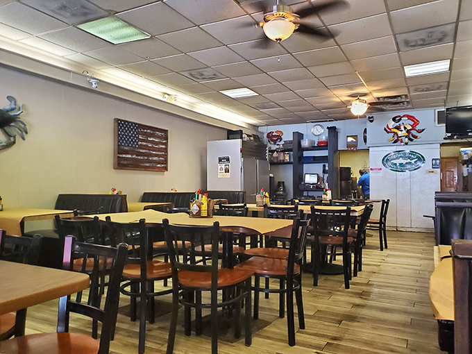 Simple tables, ceiling fans, and maritime d&eacute;cor create the perfect backdrop for crab feasts. This isn't about ambiance&mdash;it's about keeping your focus where it belongs: on the food.