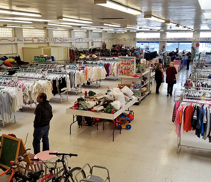 A thrifter's paradise unfolds with endless racks of possibility. Like an archaeological dig for fashion, every aisle holds potential discoveries waiting to be unearthed.