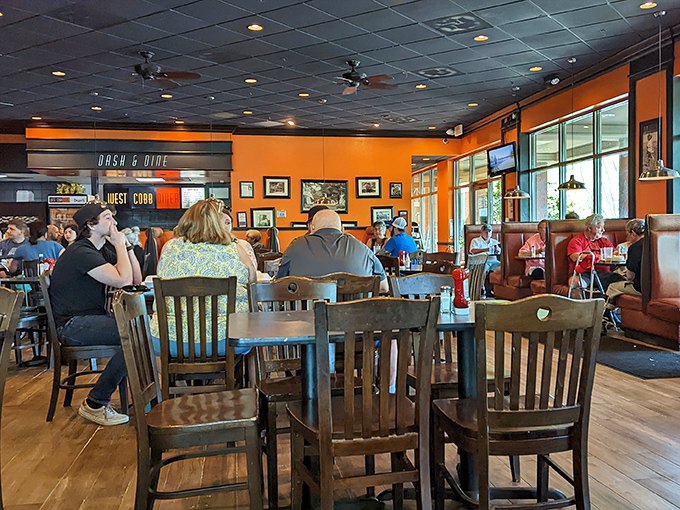 Orange walls and wooden chairs create that perfect "everybody knows your name" atmosphere where comfort food and conversation flow equally freely. 