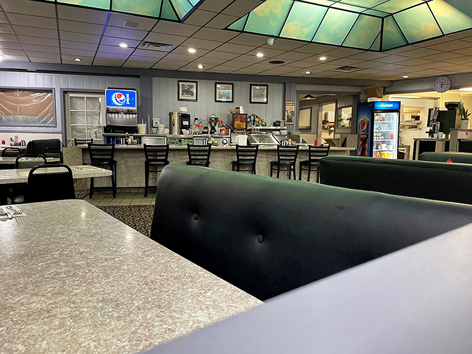 Skylit ceilings and comfortable booths create that perfect "stay awhile" atmosphere where breakfast conversations flow as freely as the coffee.