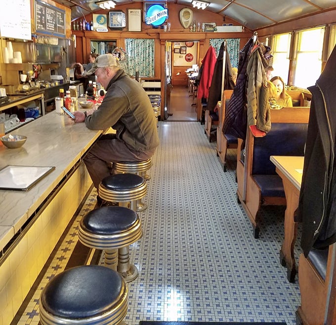 Inside, time stands still in the best possible way&mdash;chrome stools, narrow walkway, and wood paneling create that authentic Worcester Lunch Car Company charm that no modern restaurant can replicate.