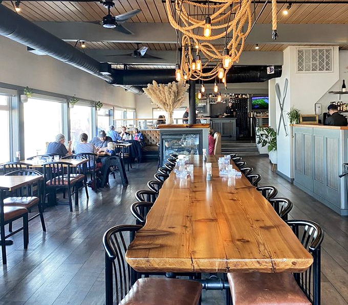 Rope chandeliers and communal tables create the perfect storm of nautical elegance and friendly accessibility.