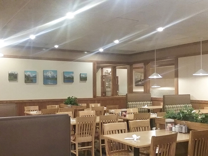 Warm wood tones and comfortable seating create the perfect backdrop for conversations that flow as easily as the coffee refills.