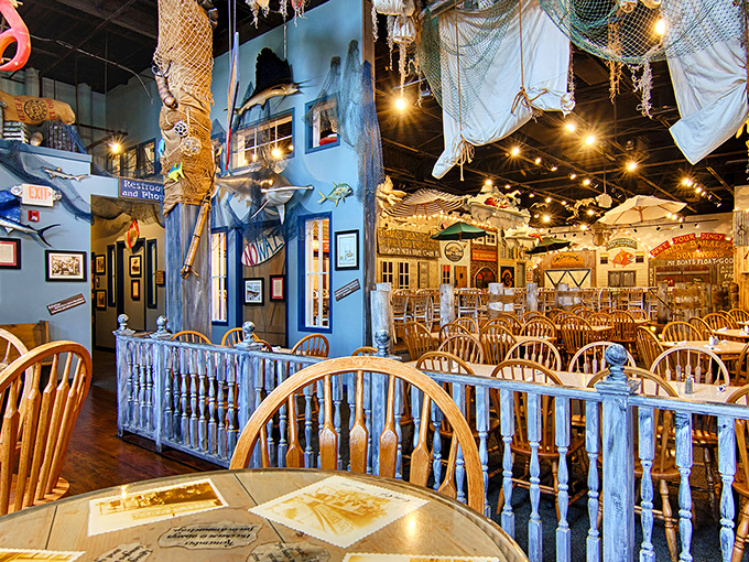 Nautical whimsy meets dining practicality inside Crabby Mike's. Fishing nets overhead and weathered wood railings create the perfect backdrop for your seafood pilgrimage.