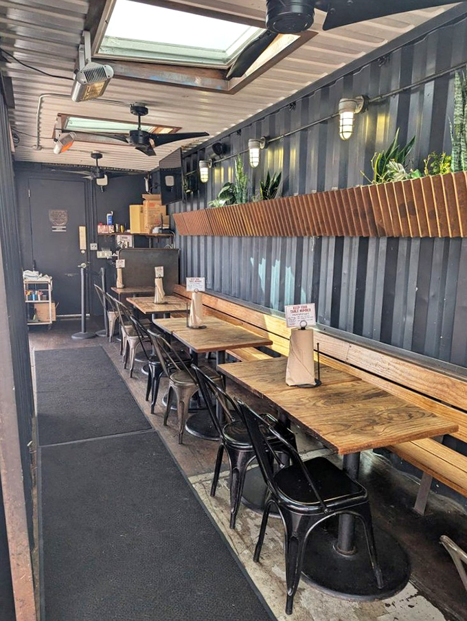 Industrial-chic meets comfort in this no-nonsense interior where every design choice whispers, "We're serious about the food, not the frills."