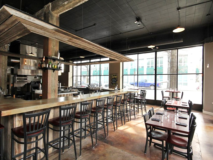 Industrial-chic meets seafood sanctuary in Rappahannock's thoughtfully designed interior. Those wooden beams have witnessed countless "oh my god" first-bite moments.