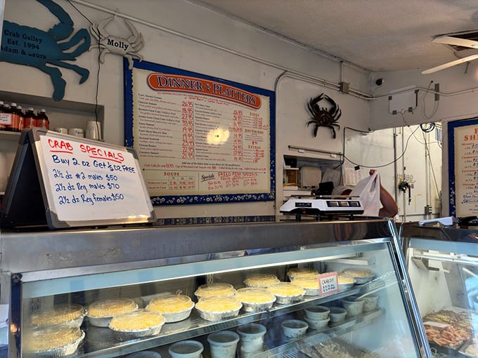 Red vinyl booths and checkerboard floors create the kind of timeless atmosphere where every meal feels like coming home.