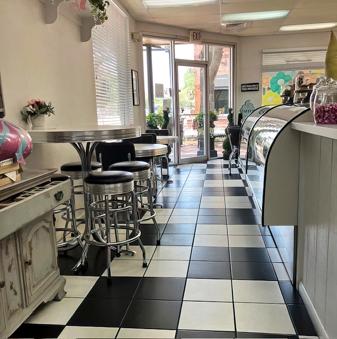 Classic black and white tiles create that timeless diner feel&mdash;where calories don't count and diet plans come to die happy deaths.