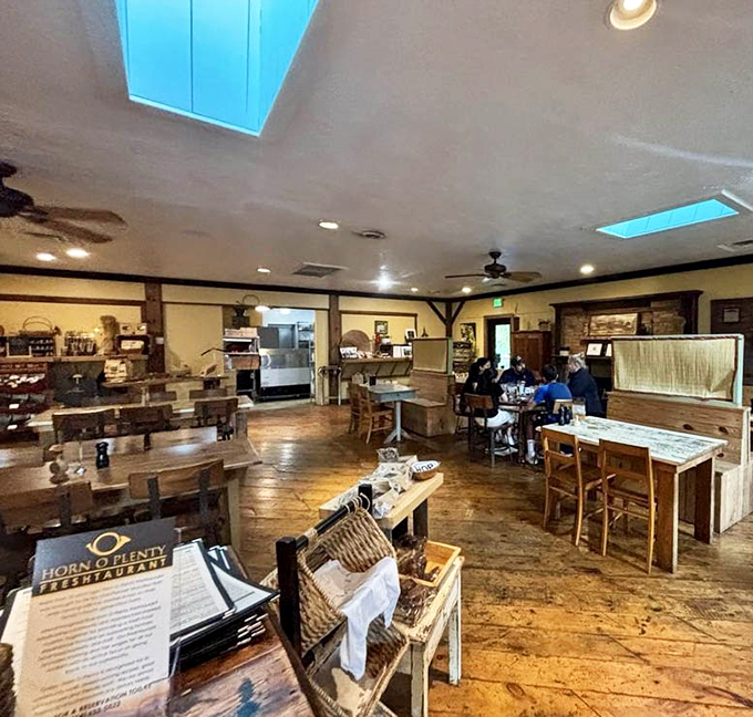 Skylights illuminate wide-plank floors worn smooth by happy diners, while wooden beams frame a space where food matters more than pretension.