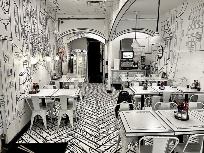 Step into a living comic book! The black-and-white interior transforms ordinary dining into an extraordinary visual feast. Your Instagram followers will think you've discovered a portal to another dimension.