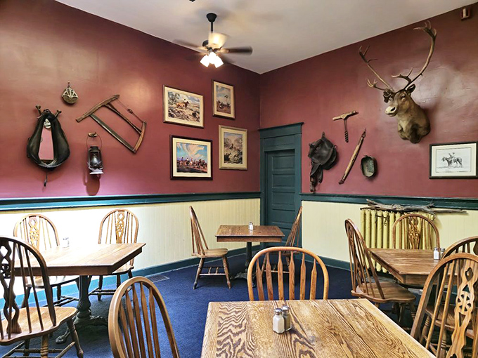 Step inside and you're transported to the Old West&mdash;burgundy walls adorned with hunting trophies and frontier memorabilia create an atmosphere Wyatt Earp would recognize.