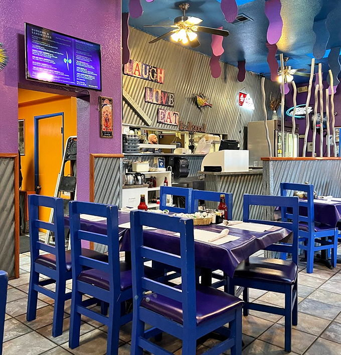 The vibrant interior feels like a color therapist and a comfort food chef joined forces to create the perfect dining sanctuary.