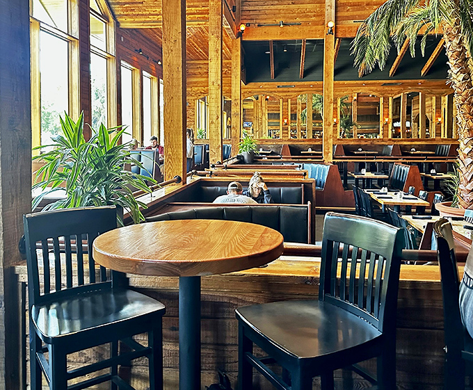 Warm wooden beams, natural light, and strategically placed greenery create that perfect "I could stay here all afternoon" ambiance.