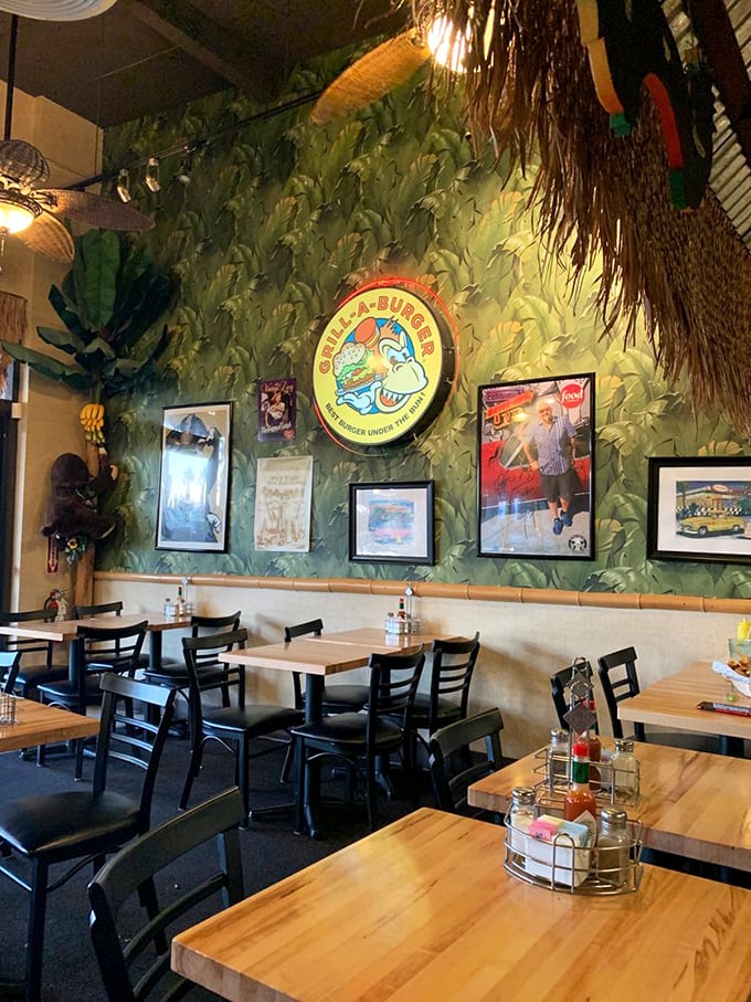 Tropical paradise meets burger heaven. The leafy wallpaper and tiki decor transport you far from the desert heat.