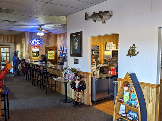 Nautical charm meets homey comfort inside, where mounted fish keep watch over hungry patrons plotting their seafood strategy.