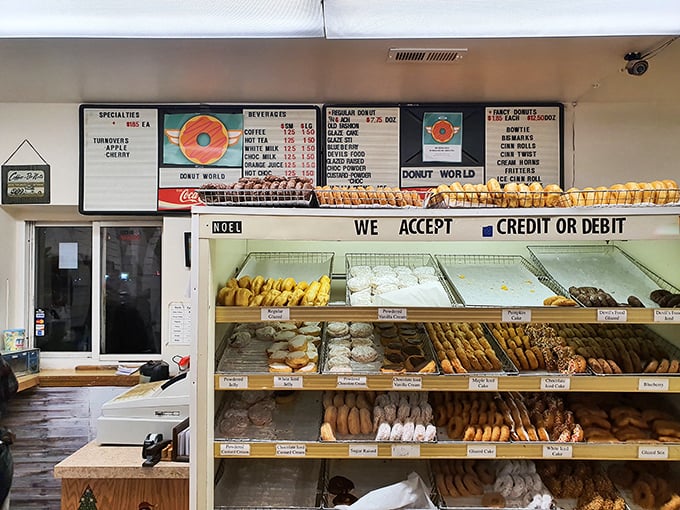 Donut paradise awaits behind the counter, where shelves of freshly made treasures sit like edible works of art, each one calling your name.