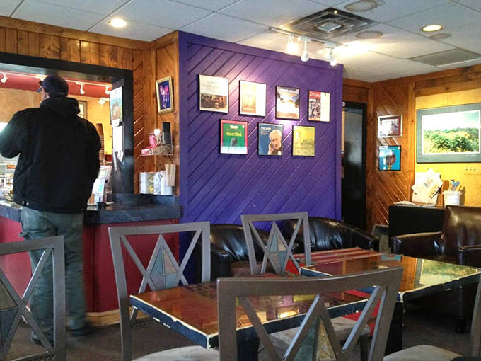 Wood paneling meets vibrant purple walls inside, creating the perfect backdrop for both serious conversations and lighthearted coffee dates.