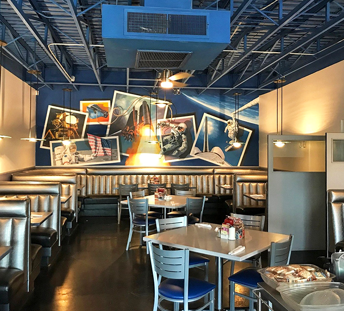 Inside, the celestial theme continues with space-age booths and vintage NASA imagery. It's like dining inside a 1960s sci-fi film, minus the cheesy special effects.