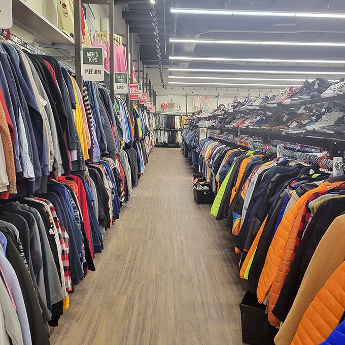 Not your grandmother's thrift store. Meticulously organized racks create shopping lanes that feel more department store than discount dive.