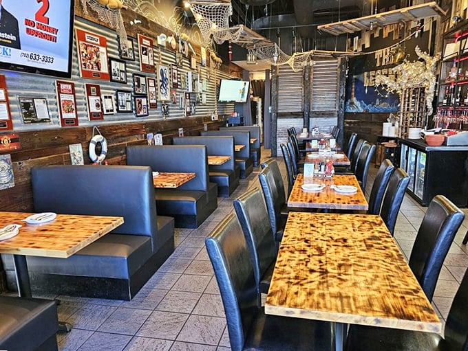 Nautical charm meets desert dining. The weathered wood tables and fishing nets create an atmosphere that whispers "coastal getaway" in the heart of the Mojave.