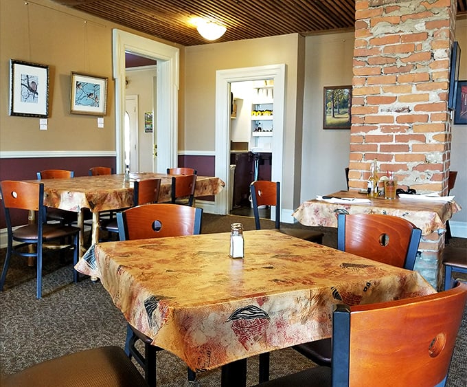 Cozy simplicity defines the dining room, where tablecloths aren't fancy linens but invitations to settle in for something special.