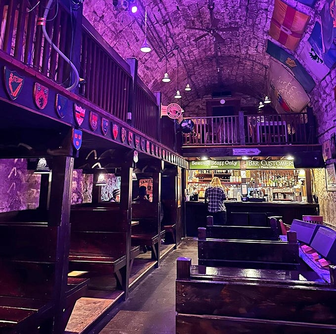 Limestone arches cradle centuries of stories overhead while wooden booths below stand ready for you to add yours to the collection.