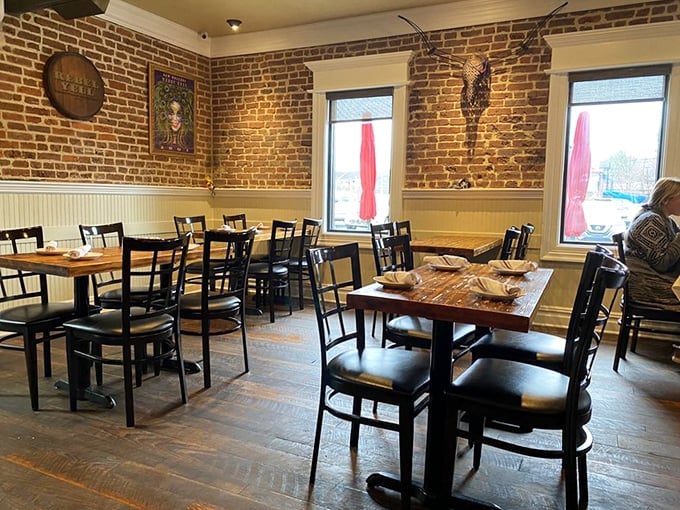 Exposed brick walls and rustic wooden tables create the perfect backdrop for the flavor explosion that's about to happen.