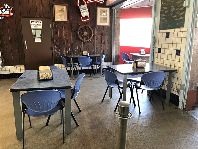 Inside, nautical simplicity reigns with wood-paneled walls and a ship's wheel that reminds you this place takes its seafood seriously, not its decor budget.