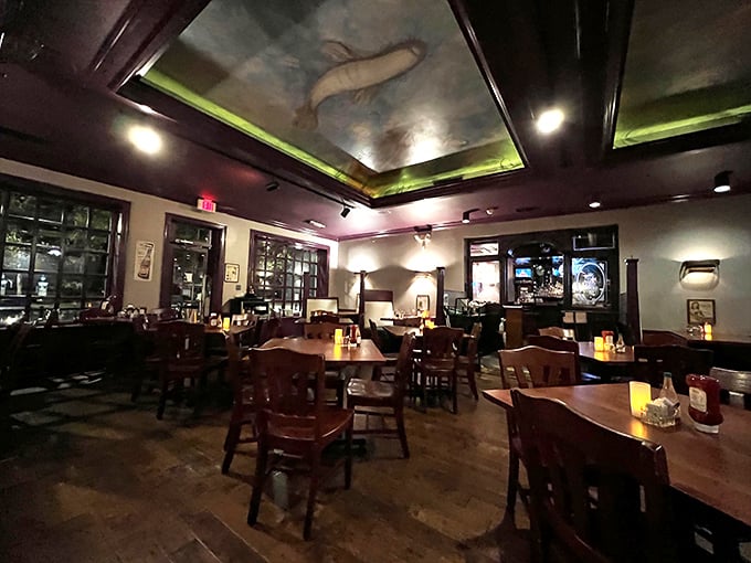 Warm wooden tables beneath an artfully decorated ceiling create the perfect backdrop for memorable meals and lingering conversations.