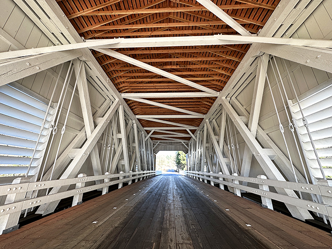 Step inside and you're transported to another era. The intricate wooden lattice work creates a cathedral-like atmosphere that whispers stories of bygone travelers.