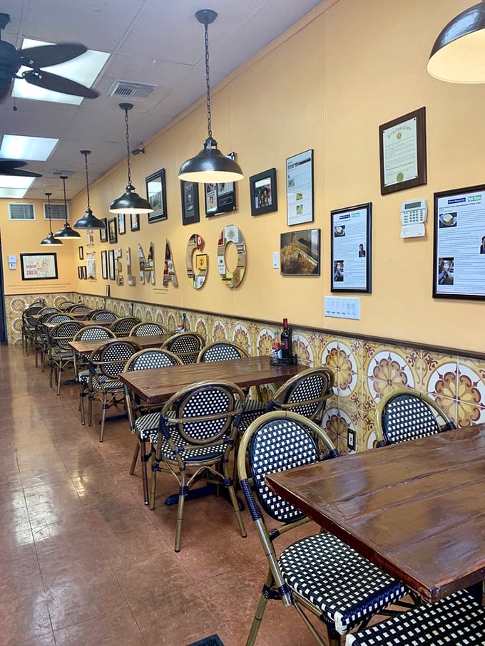 Miami's sunshine seems to be captured in these yellow walls, where framed accolades tell stories of frita triumphs and happy stomachs.