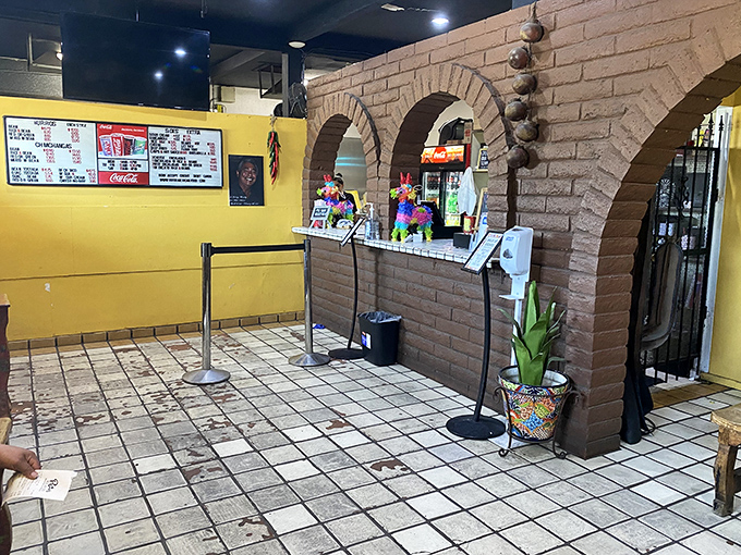 The yellow walls and brick archways aren't trying to impress you&mdash;they're saving all that energy for what comes out of the kitchen.