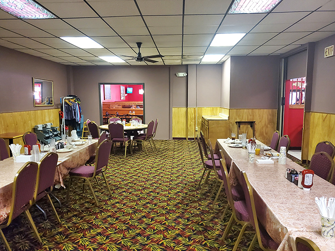 Wood paneling and burgundy chairs create the kind of timeless atmosphere where calories don't count.