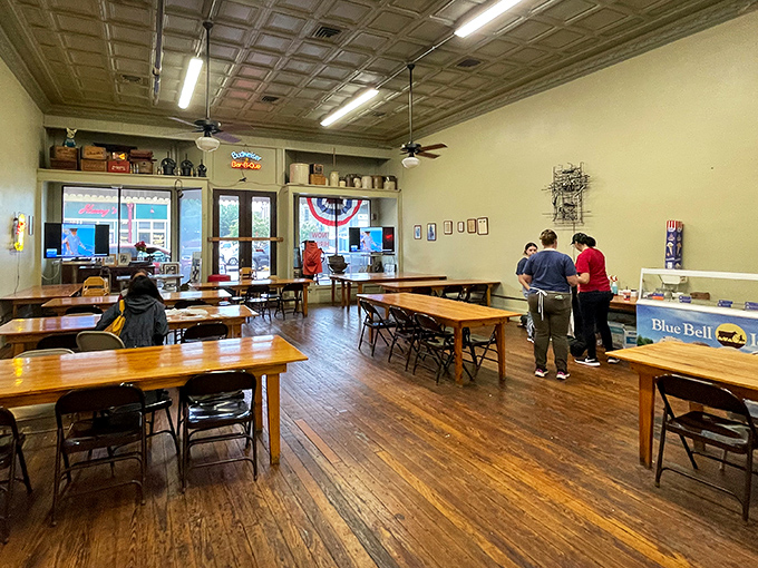 Step inside and time travel begins. These wooden tables have hosted generations of meat enthusiasts, each knife mark telling a story of brisket bliss.