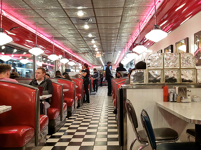 Classic red vinyl booths and checkerboard floors transport you to a time when conversations happened face-to-face and calories weren't counted.