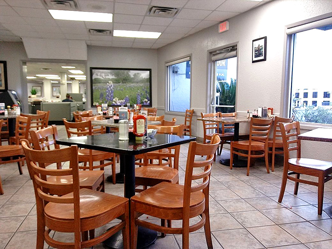 Simple wooden chairs and clean tile floors set the stage for culinary magic. This no-frills dining room has witnessed more breakfast epiphanies than a Sunday morning sermon.