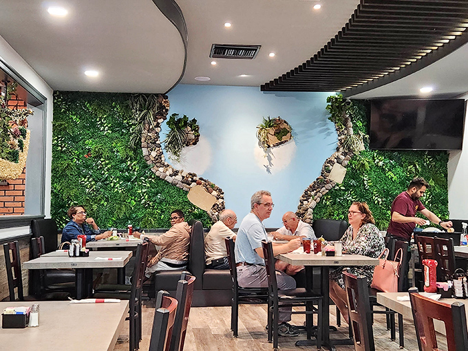 A surprising touch of nature graces the interior with its living wall design. Who knew a diner could double as an urban oasis?