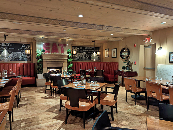 Rich wooden beams, warm lighting, and that giant "EAT" sign – as if anyone needed reminding of the mission at hand.