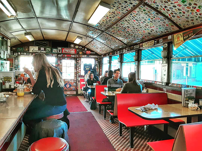 Step inside and you're transported to diner heaven &ndash; red vinyl booths, counter seating, and a ceiling plastered with stickers and memorabilia collected over decades.