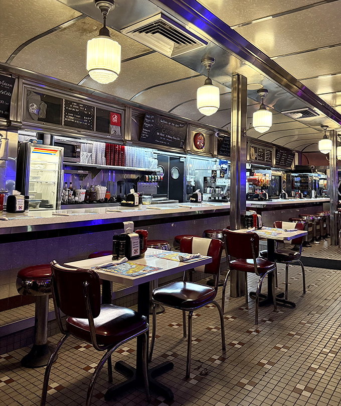 Step inside and you're transported to diner heaven&mdash;burgundy vinyl booths, swivel counter stools, and pendant lights casting a warm glow over checkerboard floors.