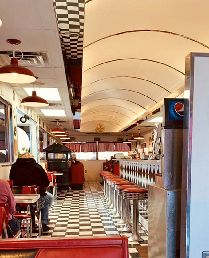 Step inside and the curved ceiling, red vinyl stools, and checkered floor whisper sweet nothings to your inner teenager who just wants a great milkshake.