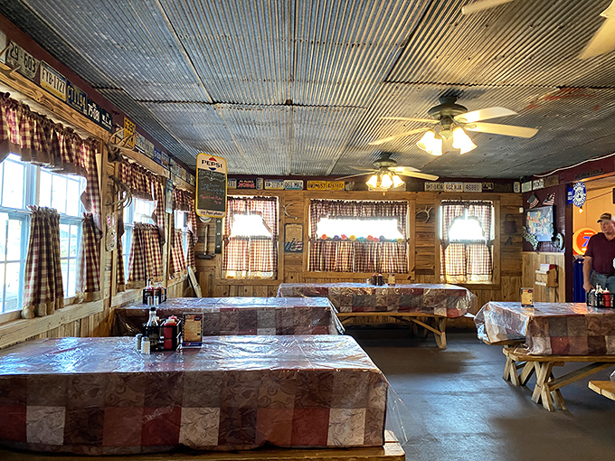 Inside, corrugated metal ceilings and checkered tablecloths create the perfect backdrop for barbecue bliss&mdash;no white tablecloths needed when the food's this good.