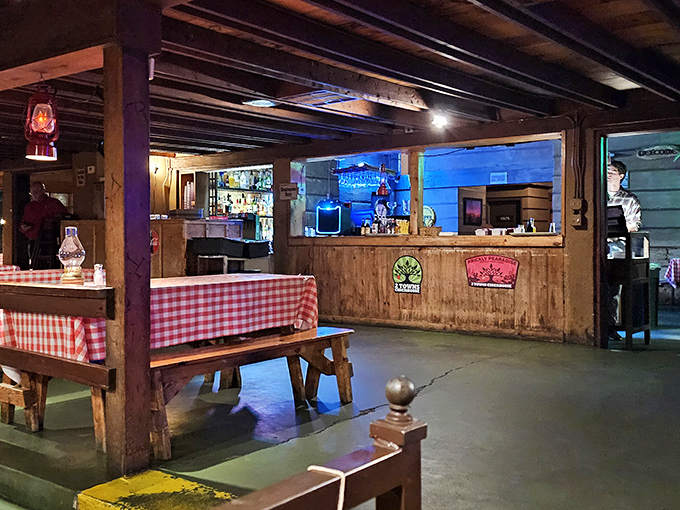 Red checkered tablecloths and rustic wooden beams create that perfect "I've discovered something authentic" atmosphere that makes food taste even better.