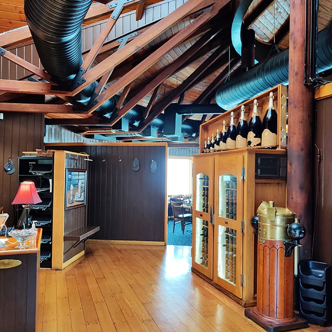 Rustic elegance defines the interior, where exposed wooden beams and warm lighting create the perfect backdrop for memorable meals and lake views.