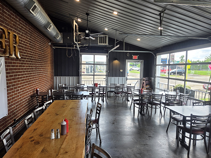 Industrial chic meets meat-lover's dream in this no-nonsense dining room. The exposed brick and metal ceiling say, "We're serious about our food, not our decorating budget."