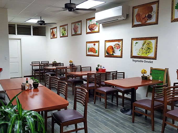 Clean, simple, and focused on what matters&mdash;the food. Those framed menu photos aren't just decoration; they're previews of coming attractions.