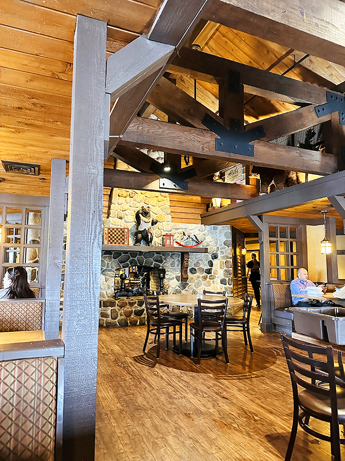 Rustic wooden beams and stone fireplaces create the perfect lodge-like atmosphere, making every meal feel like a mountain retreat getaway.