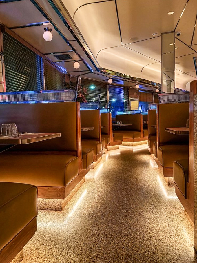 Classic diner booths where strangers become friends and calories don't count. That pressed tin ceiling has witnessed countless breakfast epiphanies.